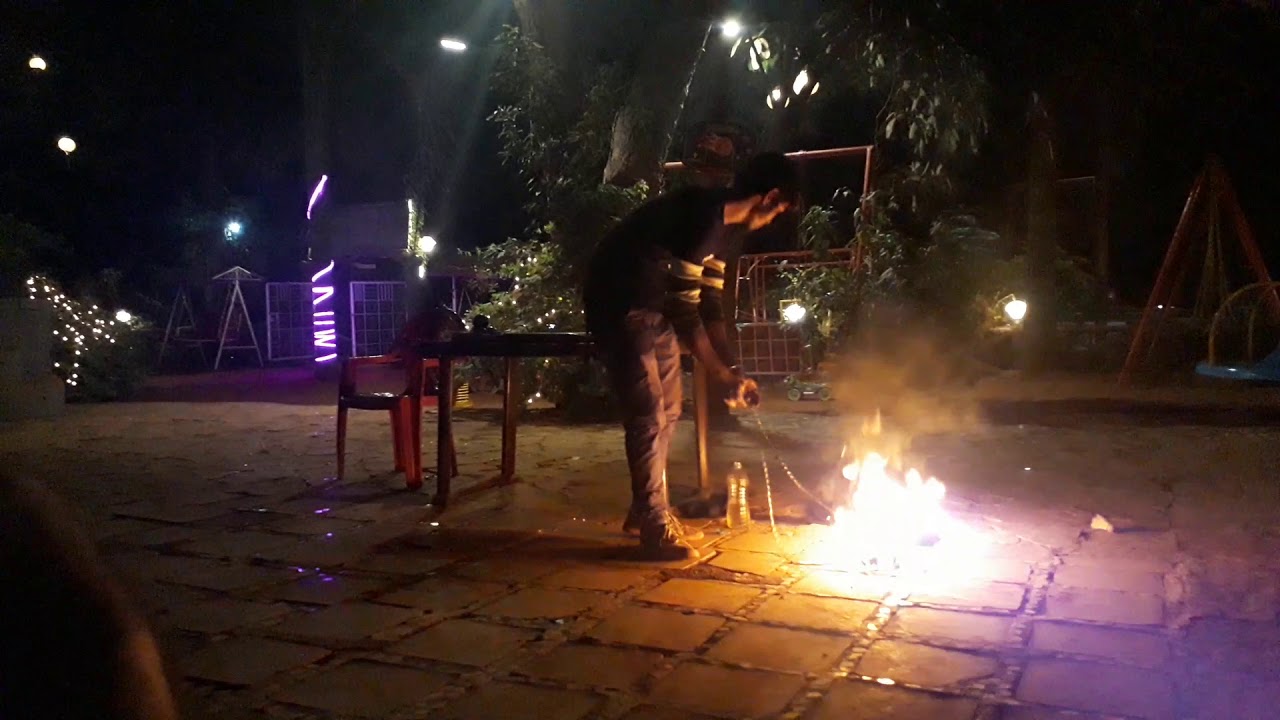 Person playing with fire - YouTube