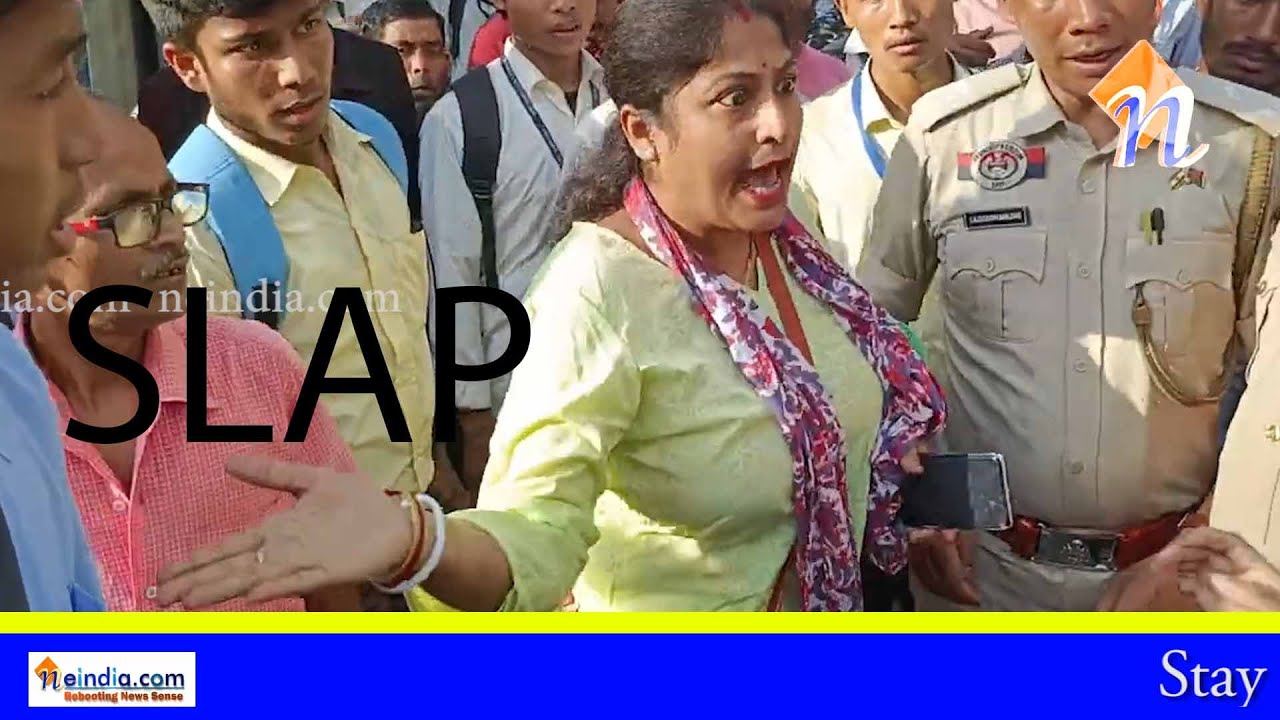 Viral video shows a woman attempting to slap collage students during a ...