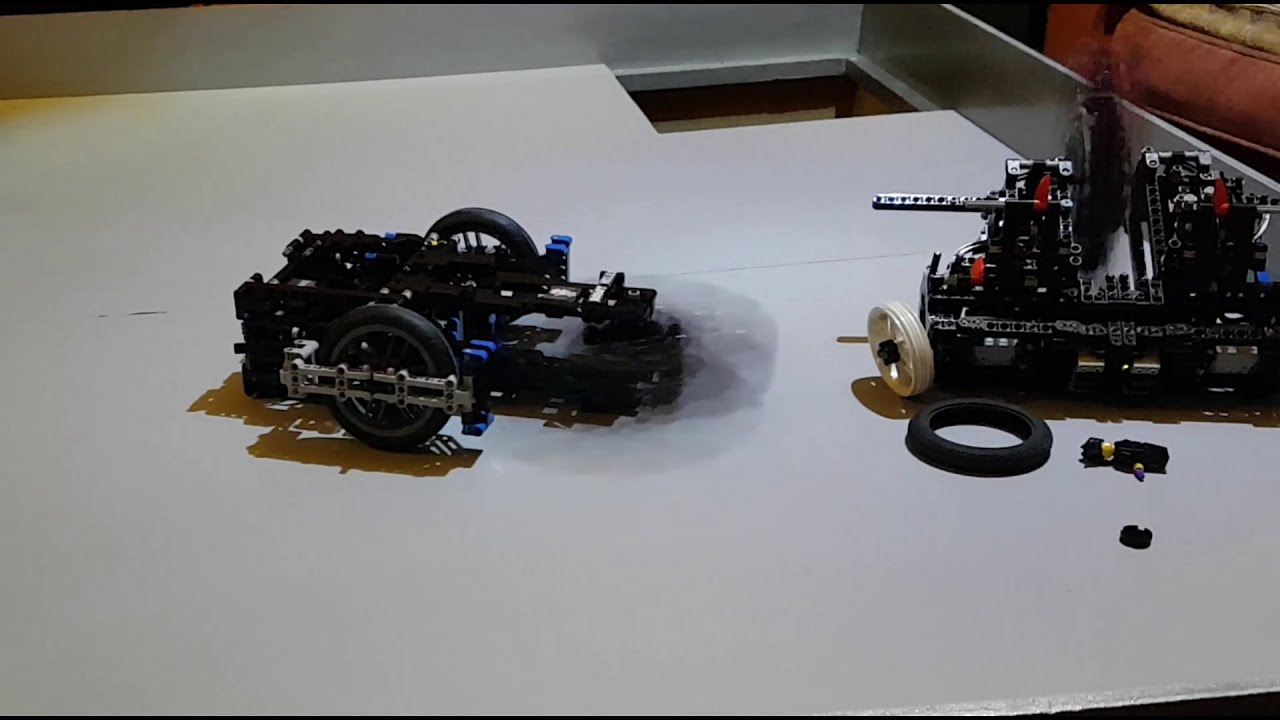 Robot Smith vs Robot Miles - Lego robot battle (driving both using one ...