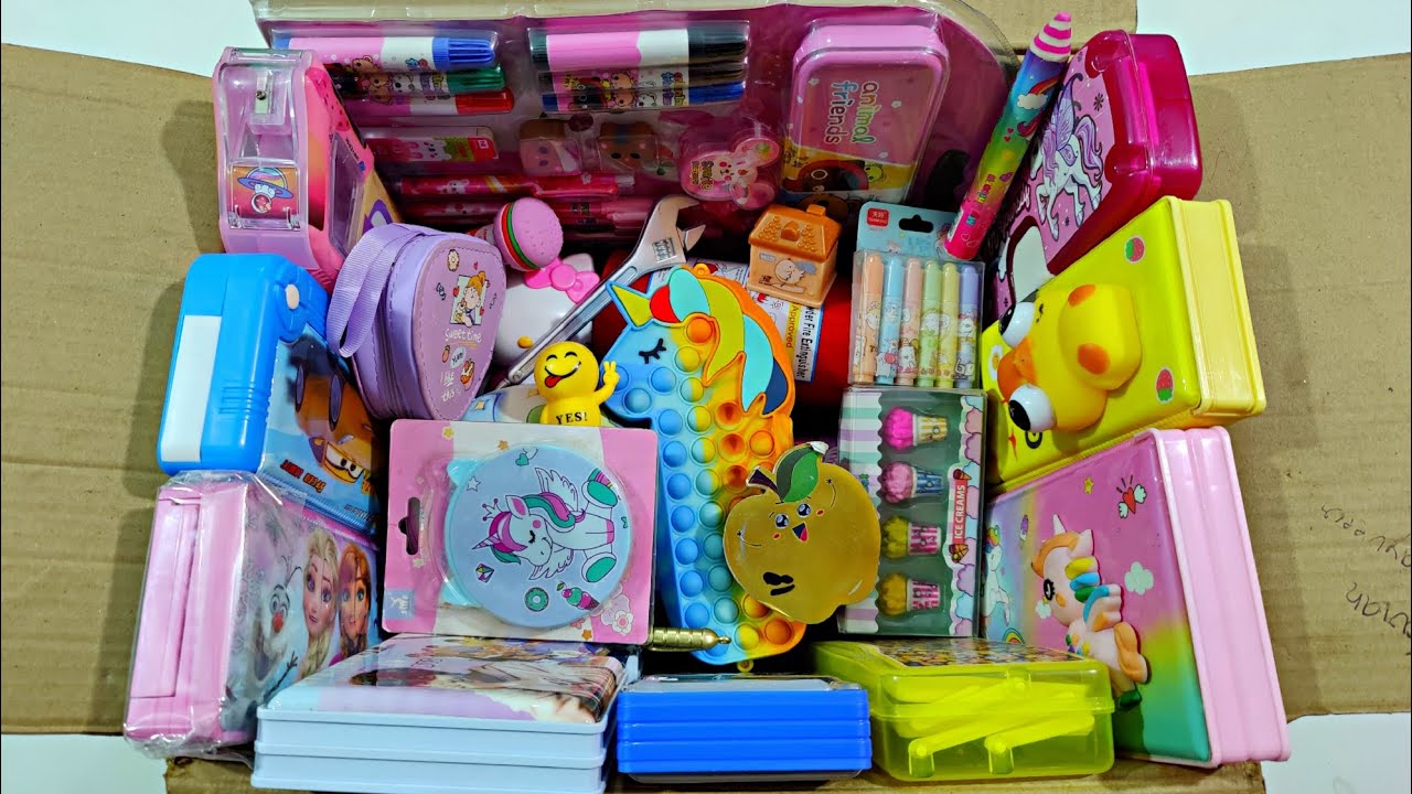 box full of stationery items, pencil box collection, pencil sharpener ...