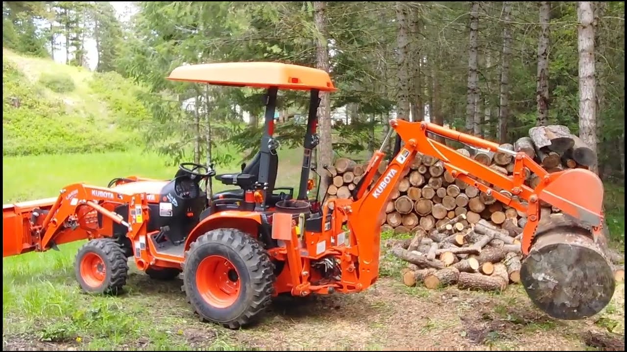 Using the BH70 and Kubota B2301 to cut up firewood. - YouTube