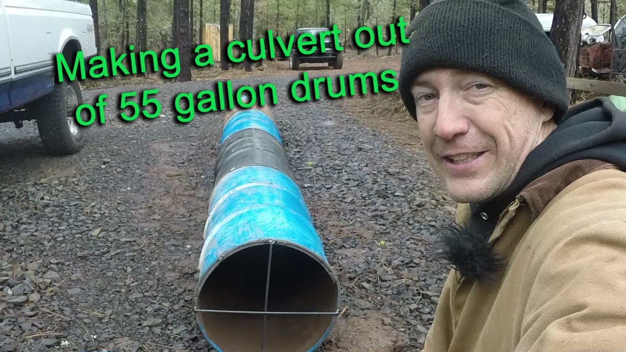 Making a culvert out of 55 gallon drums - YouTube