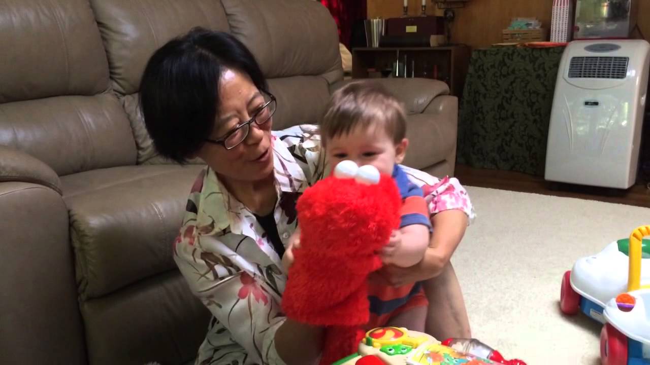 Playing with Chinese Elmo - YouTube
