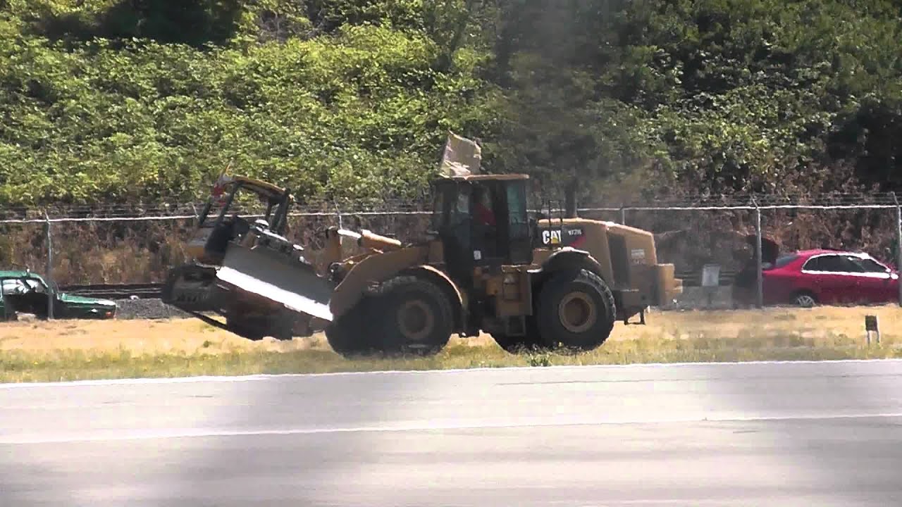 CAT Wheel Loader vs John Deere Dozer - YouTube