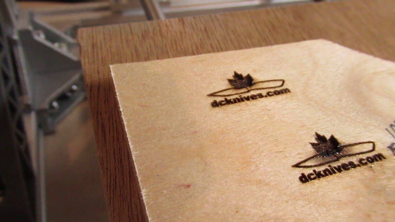 Testing 5.5 Watt laser etching logo in wood - YouTube