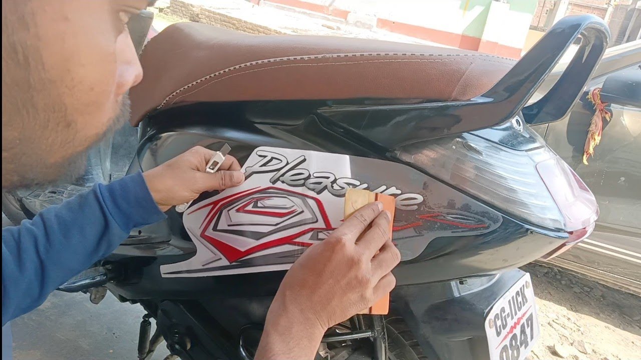 Hero honda pleasure scooty company graphics sticker installation in ...