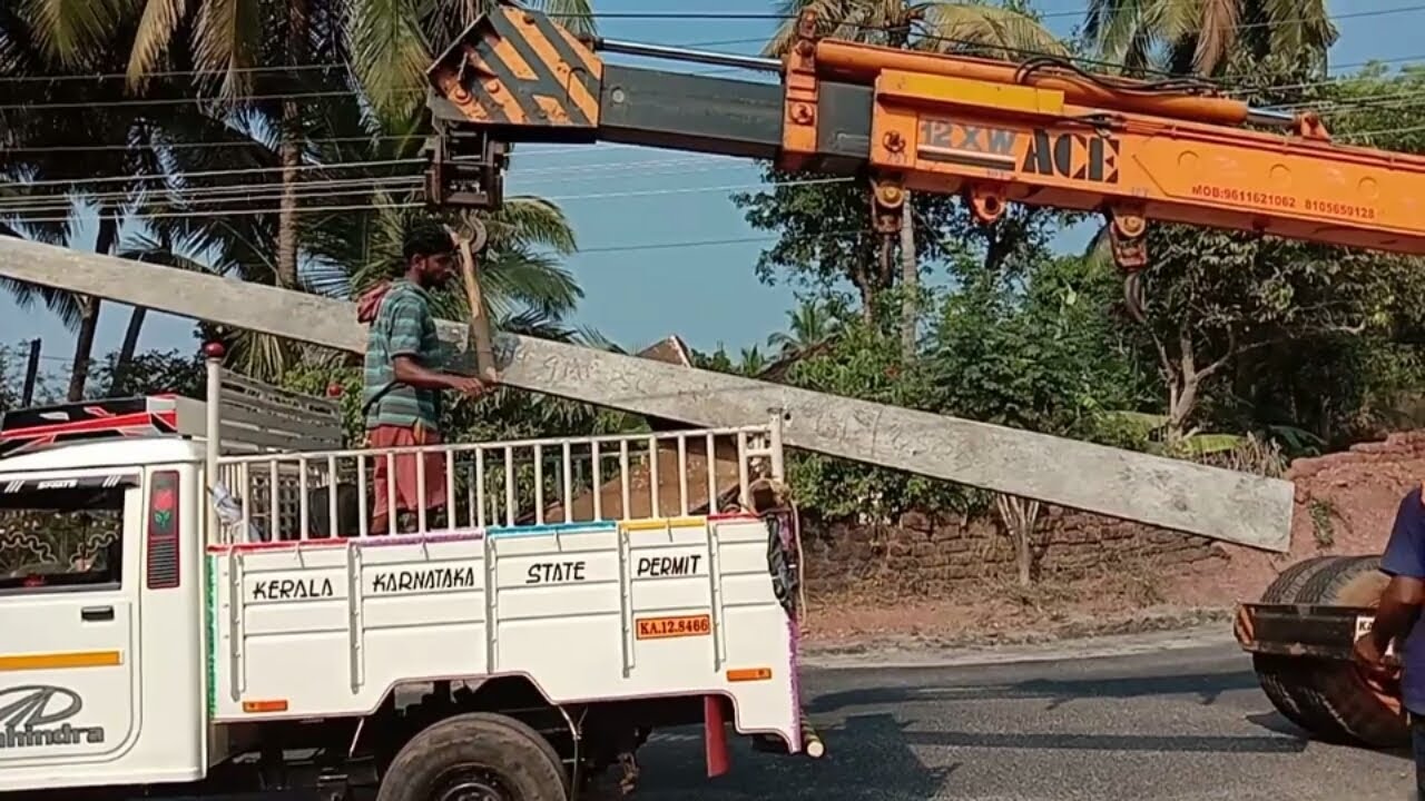 Crane Lifting Electric Pole | Electric Pole Lifter - YouTube
