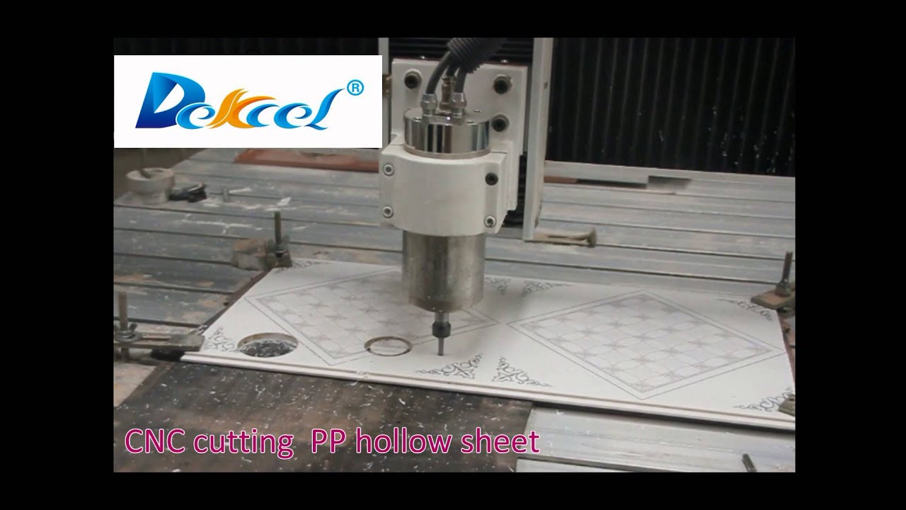 Dekcel cnc router cutting PP hollow plastic ceiling sheet - YouTube