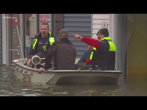 Rescues made as Yantic River floods downtown Norwich - YouTube