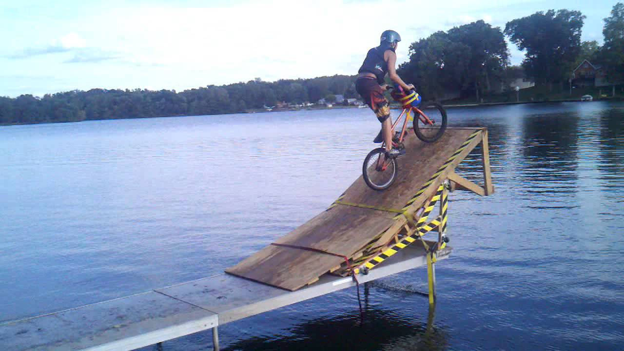 Josh struble bmx jtump into lake latonka 8-11 - YouTube