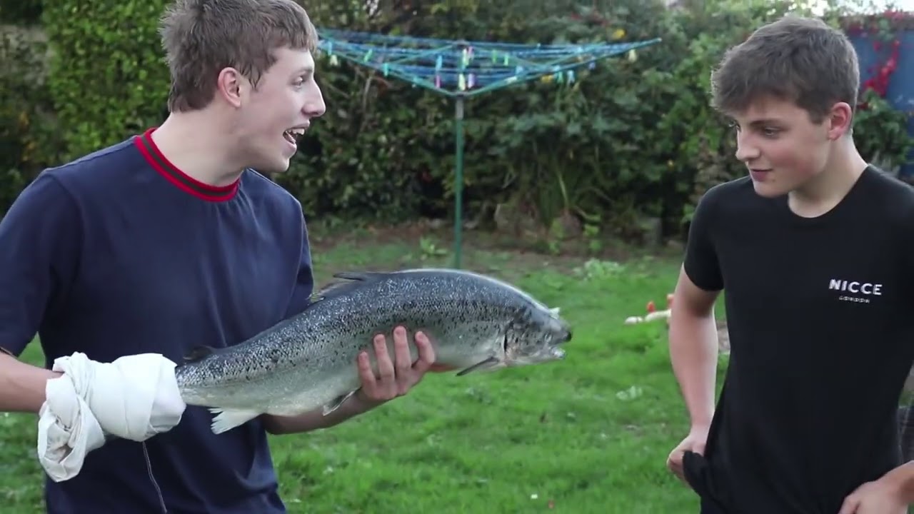 W2S hits his brother with a massive fish - YouTube