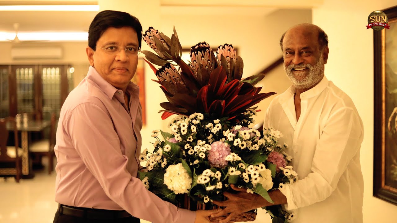 Mr. Kalanithi Maran presents cheque and BMW X7 to Superstar Rajinikanth ...