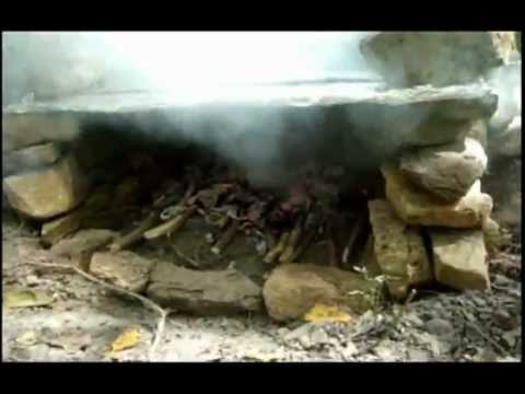 Homemade Smoker Built out of Rocks - YouTube