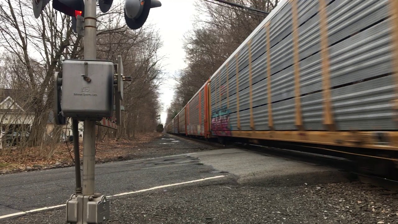 CSX train flies over loose track - YouTube