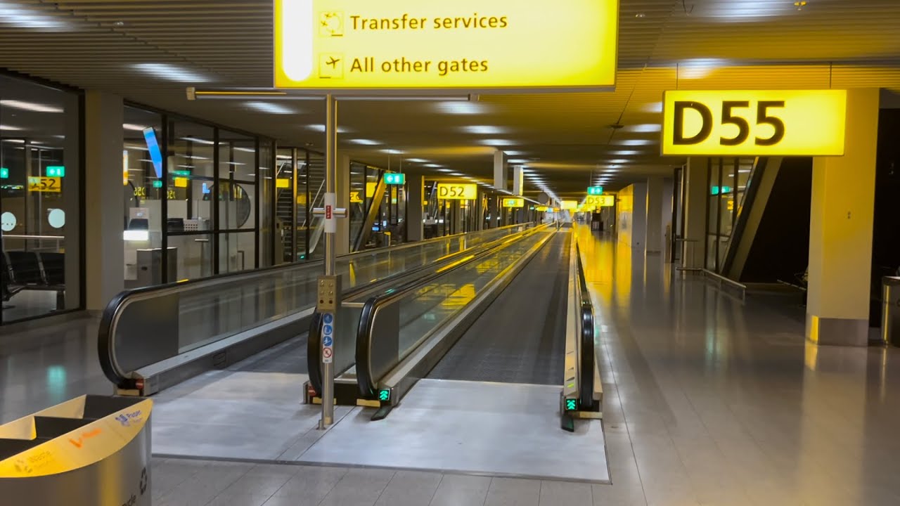 Amsterdam Schiphol Airport - 2x O&K Travelator ride from Departure ...
