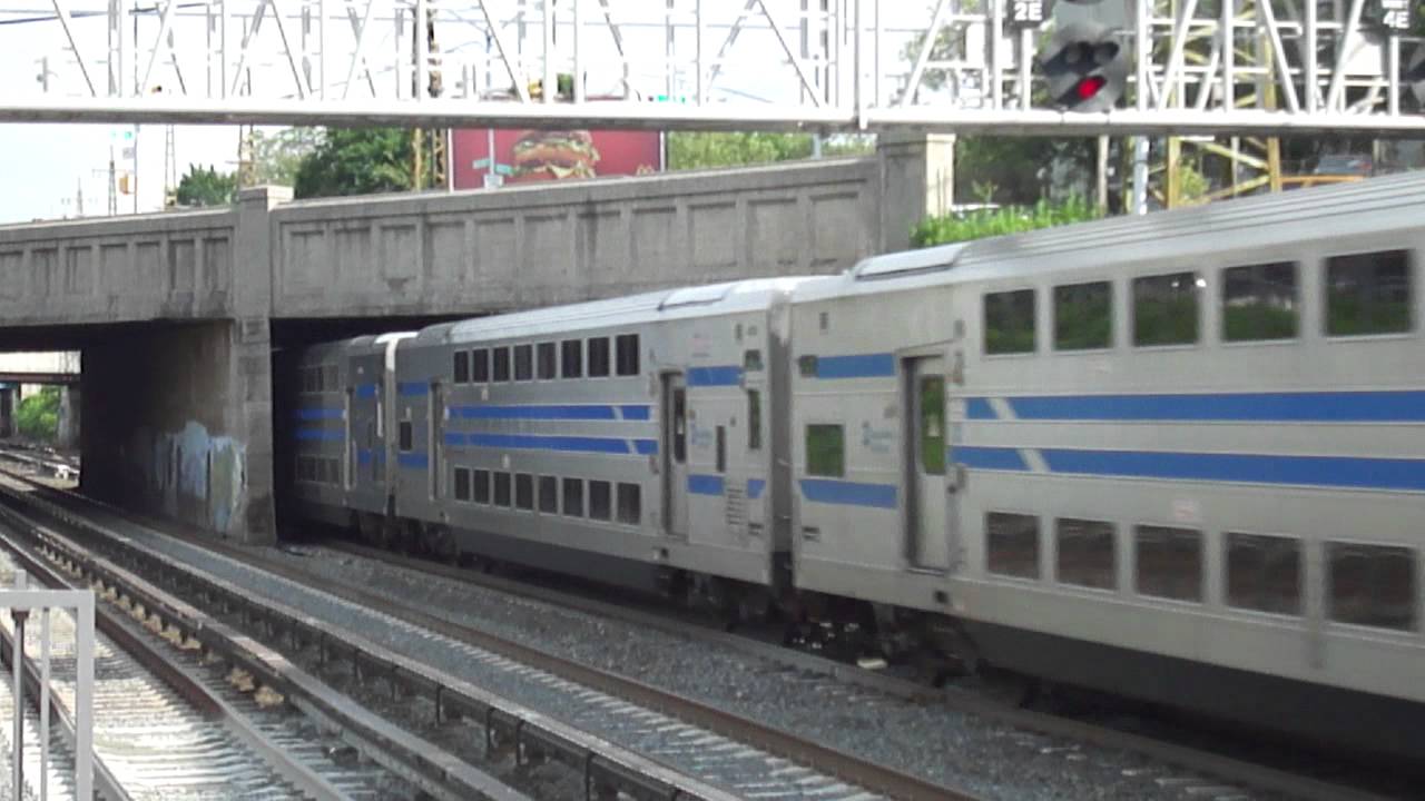 Montauk Bound Exp W/ DM30AC #502/522 Hauling through Woodside Station - YouTube