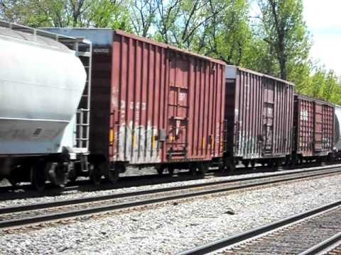 Norfolk Southern 8888 leads mixed-freight train and meets Soo 4450 on ...