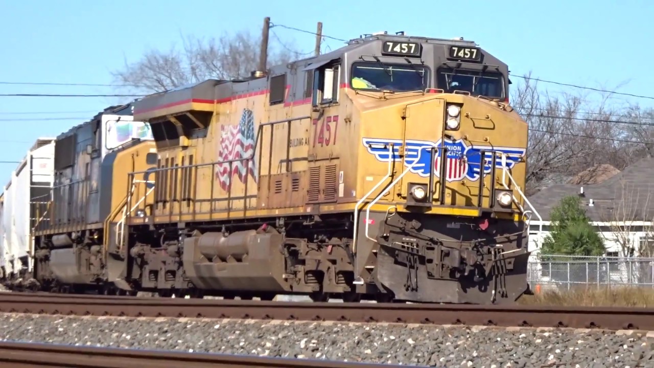 UP 7457, GE AC45CCTE; CSX 4557, EMD SD70MAC; Tower 71, Houston, Texas ...