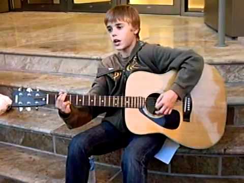 Justin Bieber singing outside the Avon Theatre. - YouTube