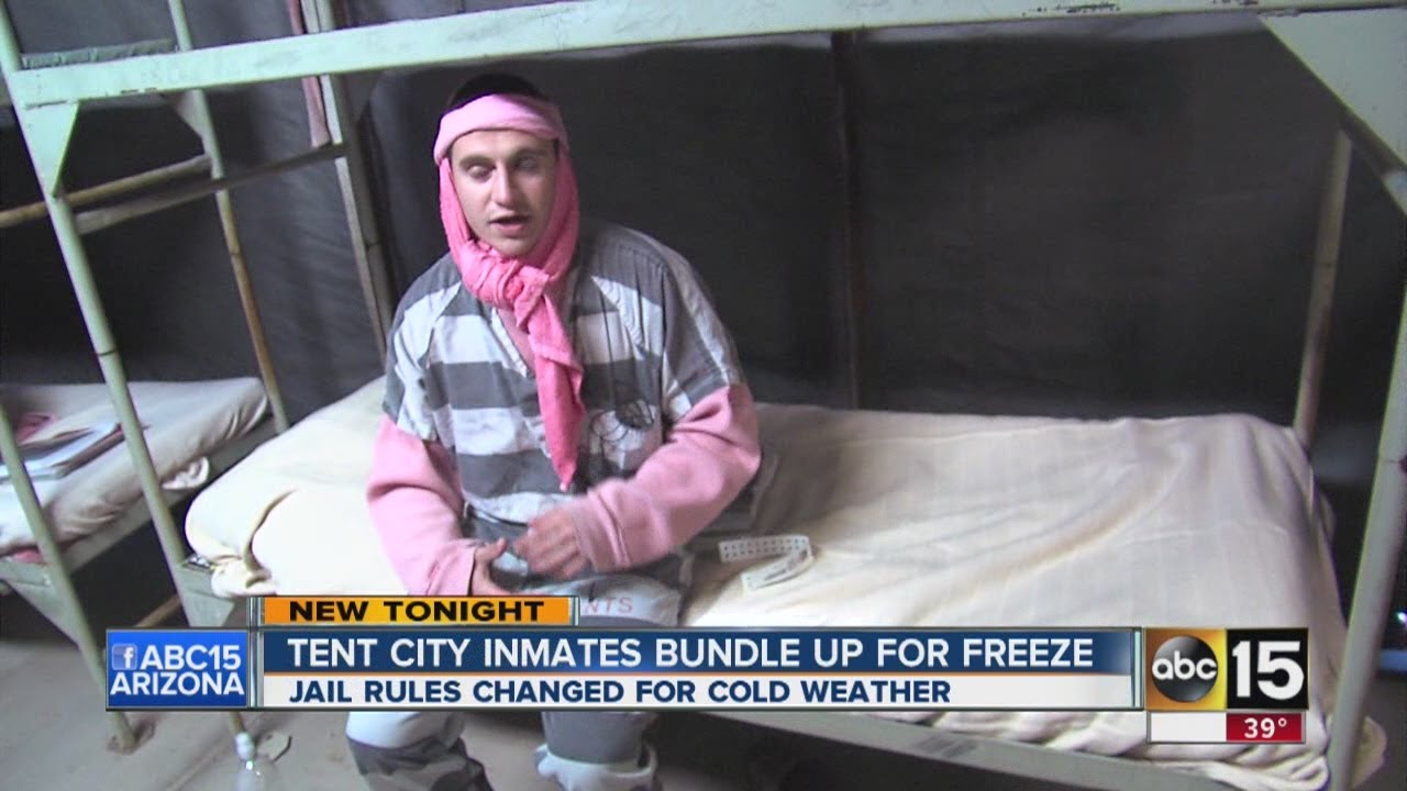 Tent City inmates bundle up for freeze - YouTube
