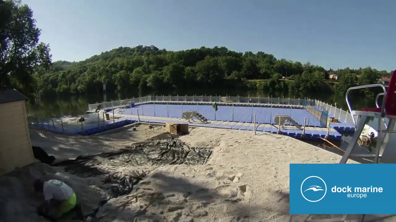 Installation of a floating swimming pool in a river - YouTube