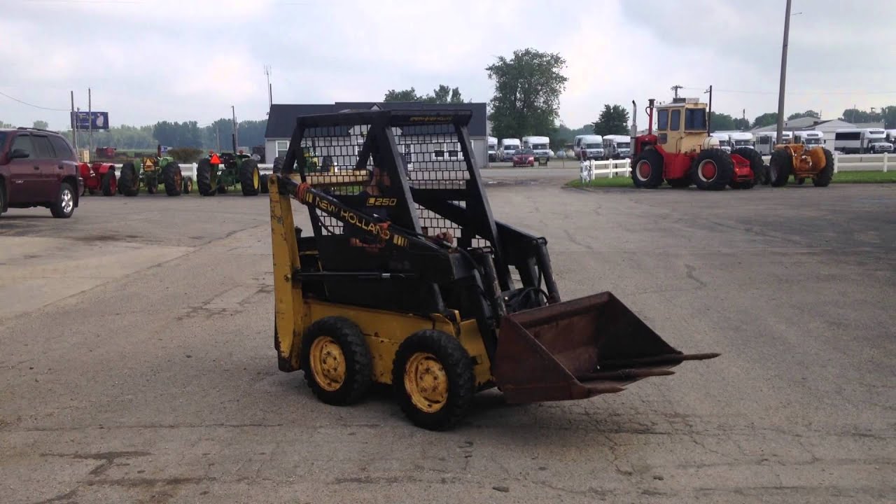 NEW HOLLAND L250 SKID STEER - YouTube