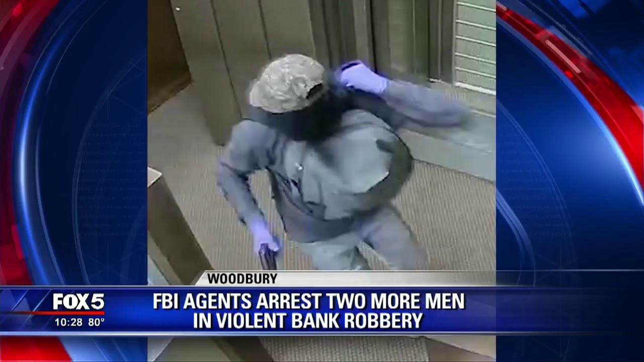 FBI agents arrest two more men in violent bank robbery - YouTube