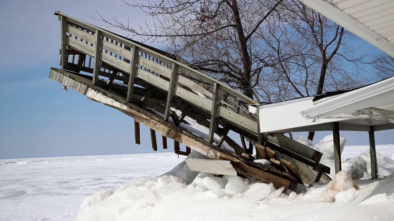 Ice shoves damage buildings on the Green Bay shoreline - YouTube