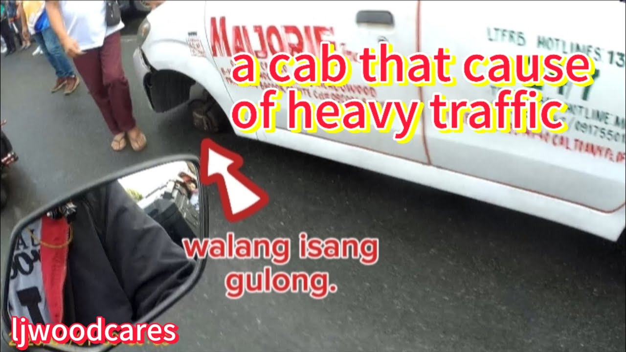 A Cab lost one wheel that cause of heavy traffic, #motovlog #traffic # ...