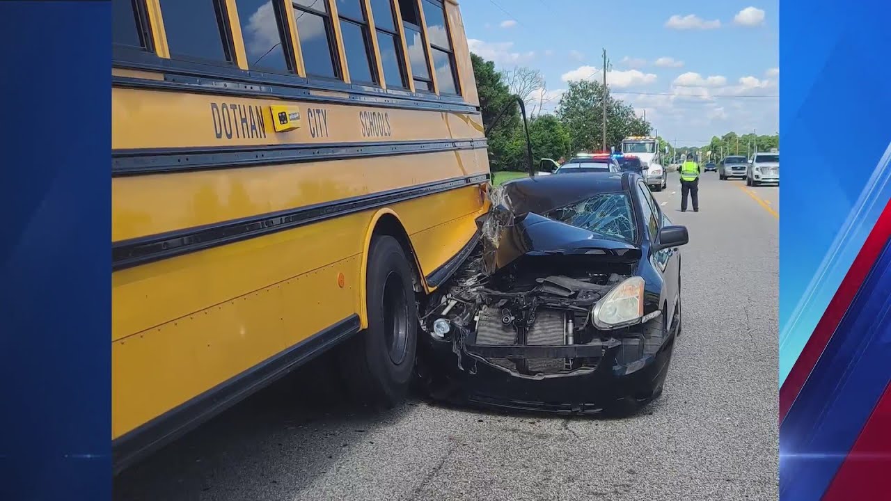 Car crashes into school bus - YouTube