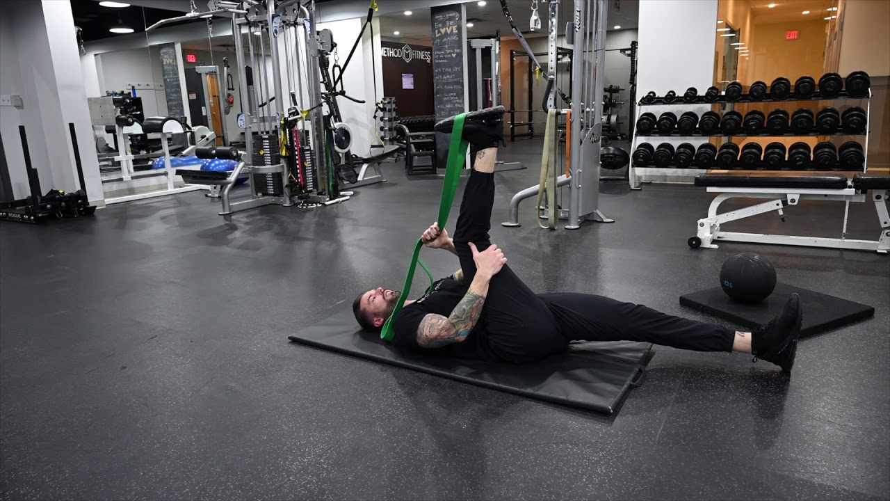 PNF lower body stretching using a band - YouTube