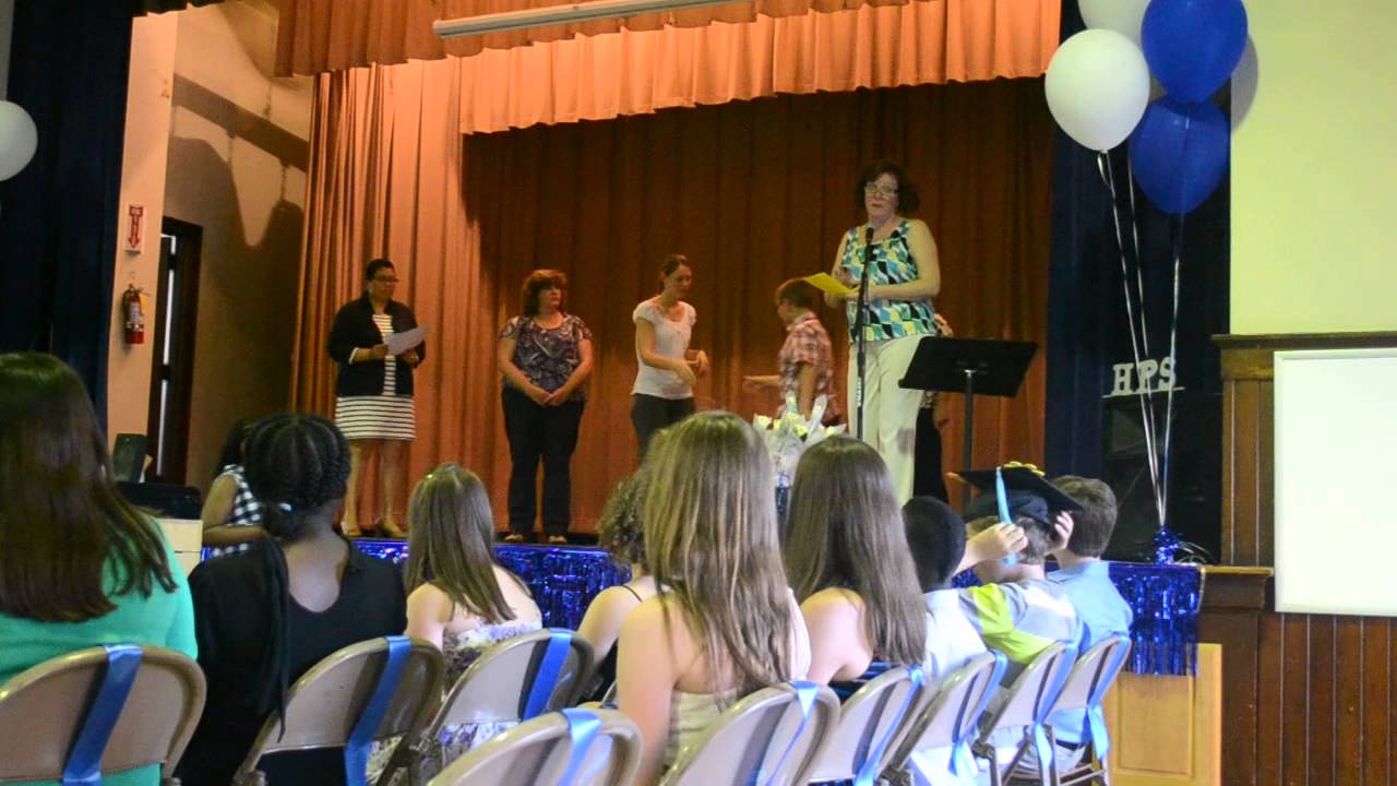 Kurtis' 6th grade graduation - getting his diploma (certificate) 5/28 ...