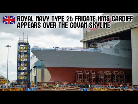 Royal Navy Type 26 frigate HMS Cardiff appears over the Govan skyline ...