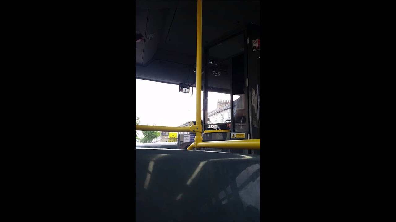 A very happy bus driver singing his head off - YouTube