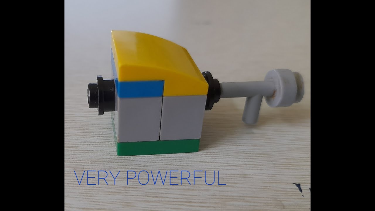 How to make a LEGO Spring loaded shooter (It works better than the one ...