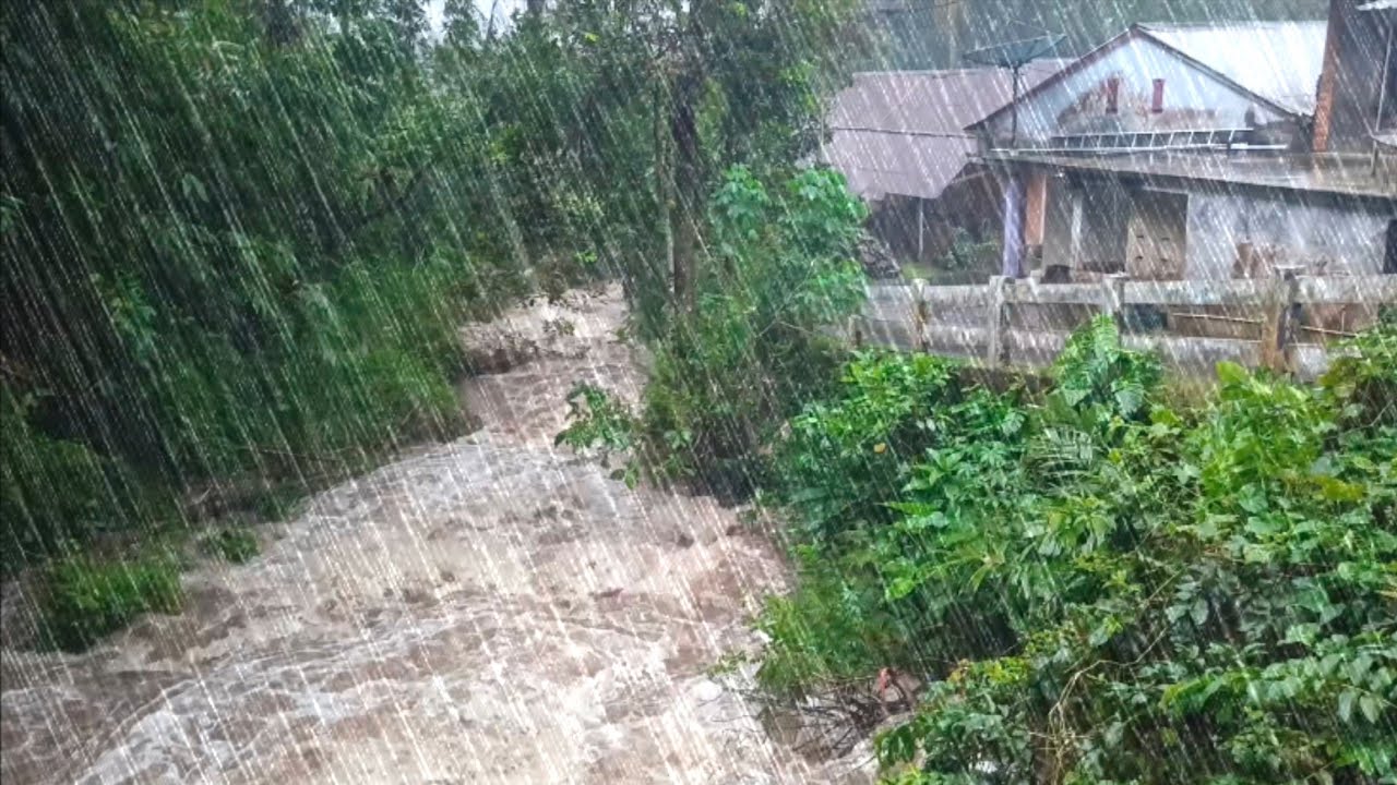 Heavy rain and flash floods, village atmosphere before being hit by a ...