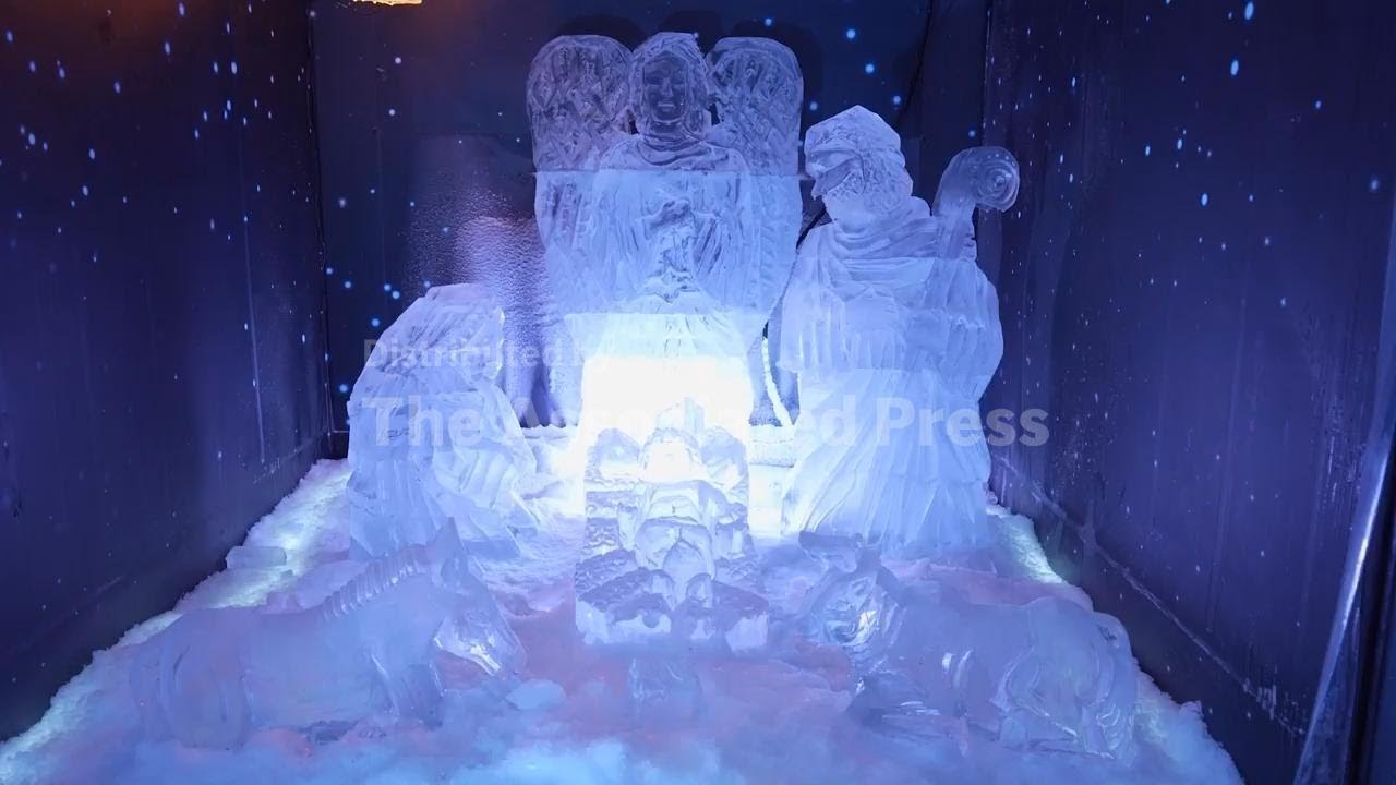 Ice nativity scene in Colombia brings smiles to families - YouTube
