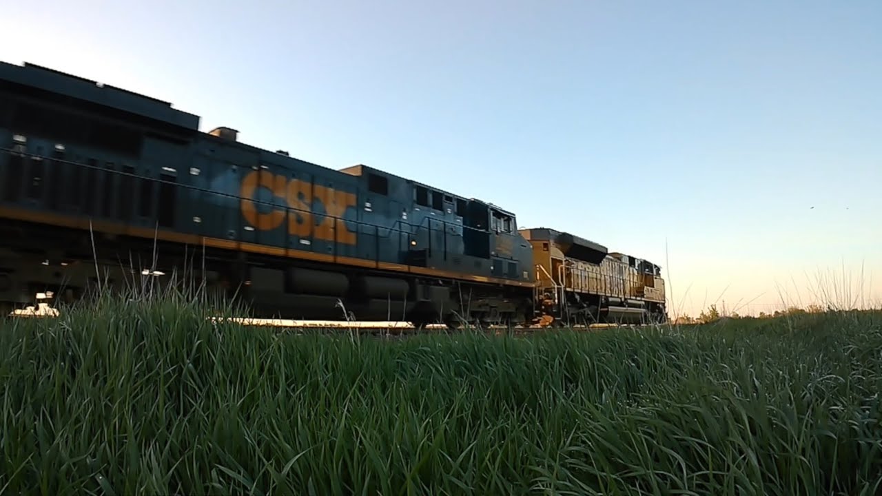 CSX and UP locomotives morning southbound tanker train on the Spine ...