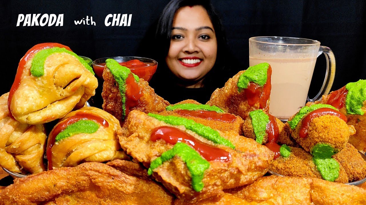 Eating Bread Pakoda, Noodles Samosa, Brinjal Pakoda, Vegetables Pakoda ...