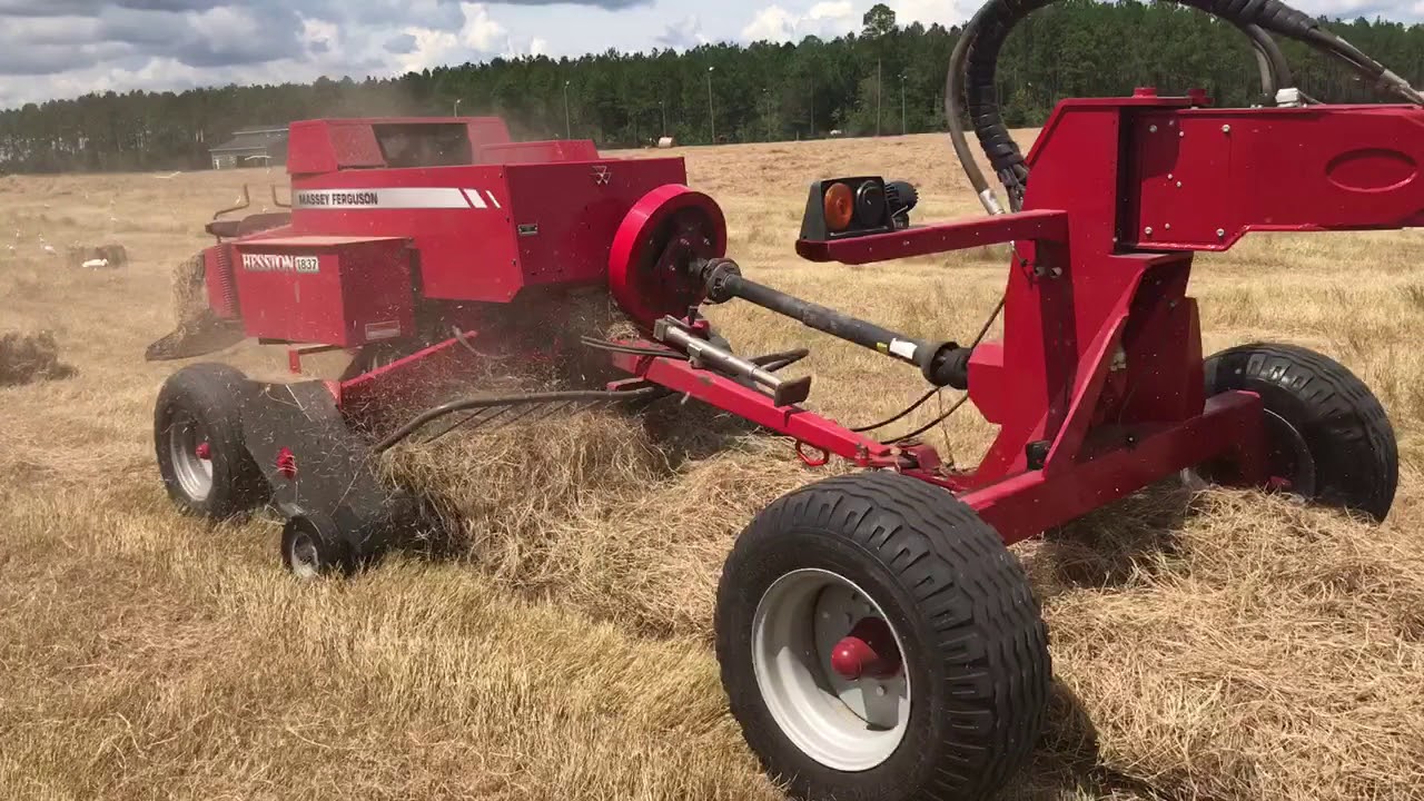 Massey Ferguson 5710 pulling twin balers - YouTube