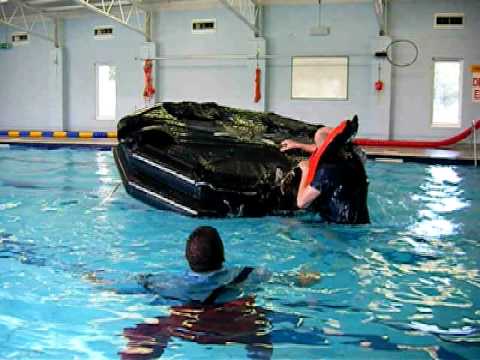 Sea Survival righting life raft.avi - YouTube