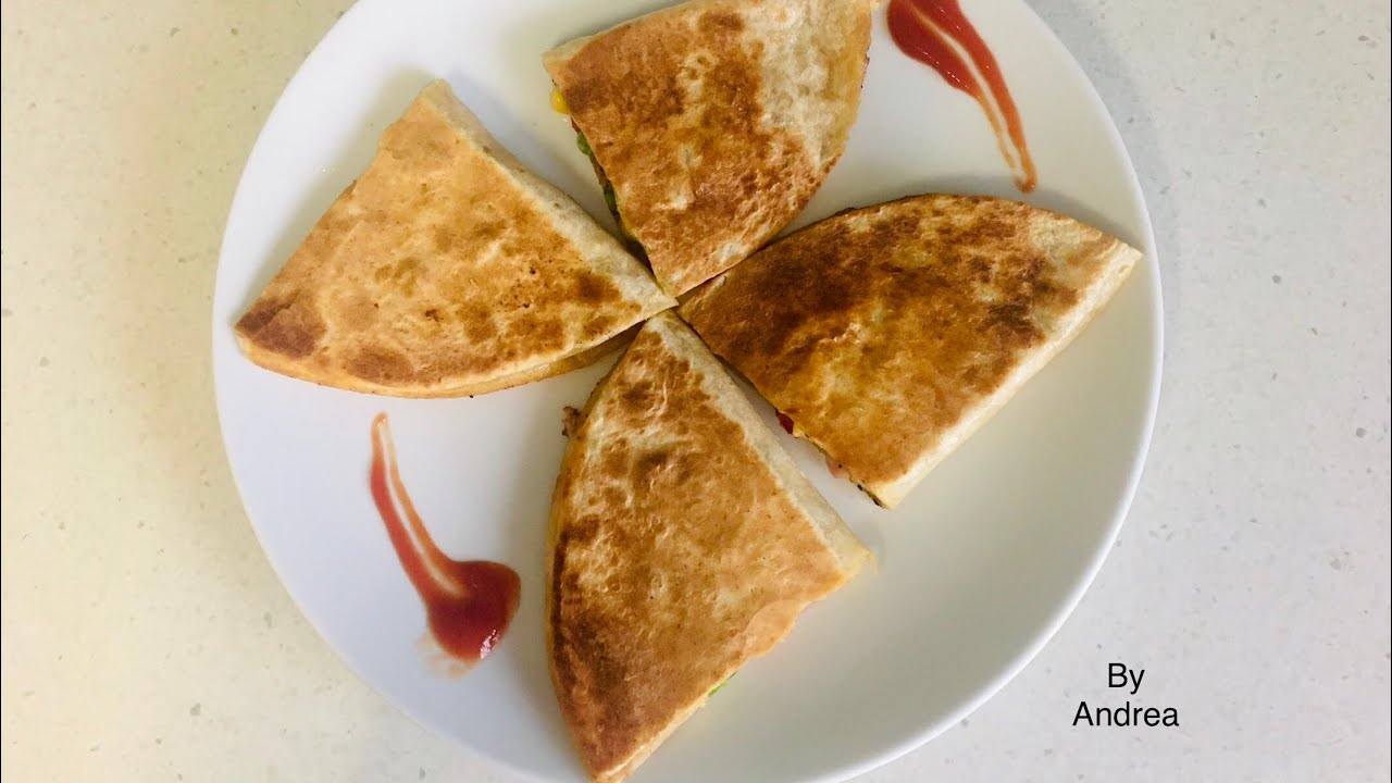 Grilled Roti With Veggie & Cheese Filling Along with a Drizzle Of ...