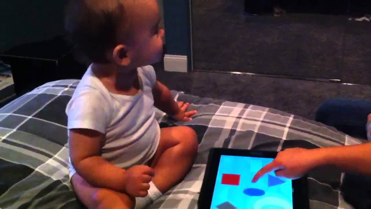 Nicholas playing the iPad - shapes & puzzles! - YouTube