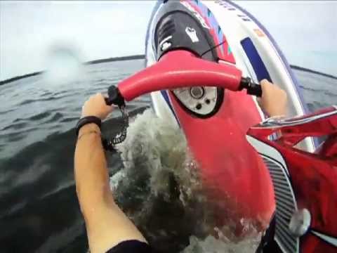 Trying NOT to sink our Jet ski during EXTREME Stunts! - YouTube