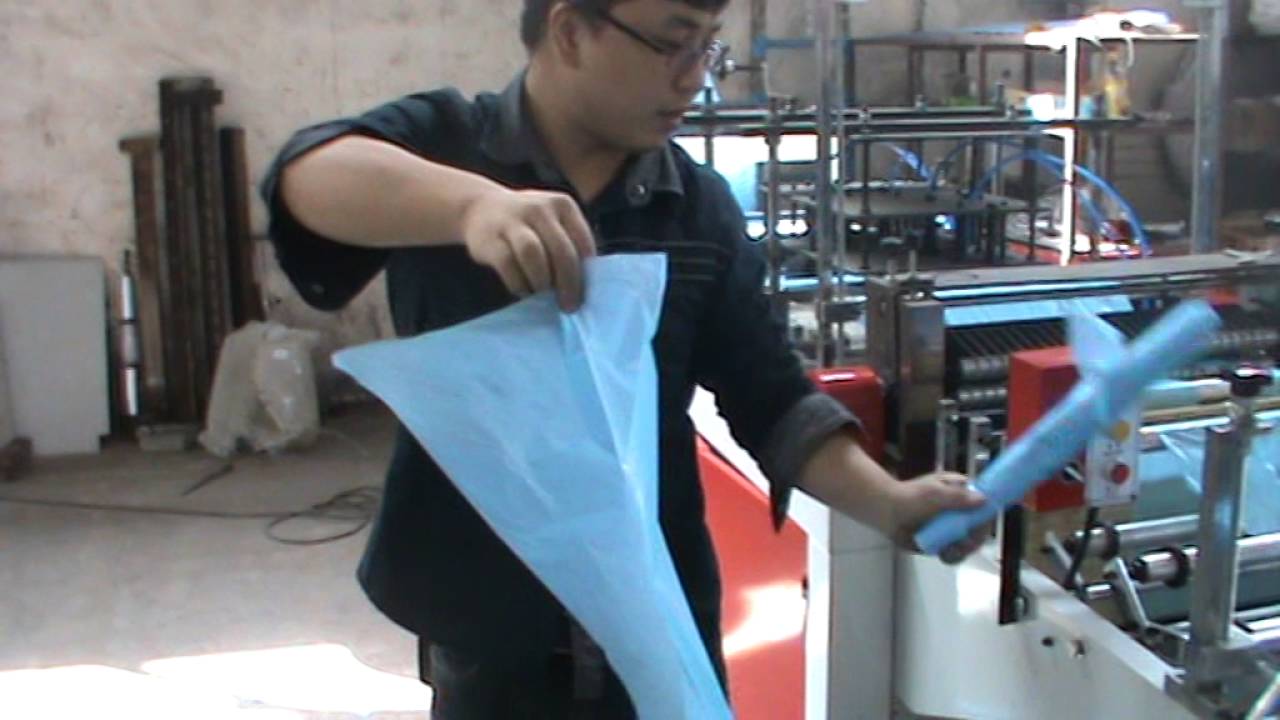 disposable PE apron machine - YouTube