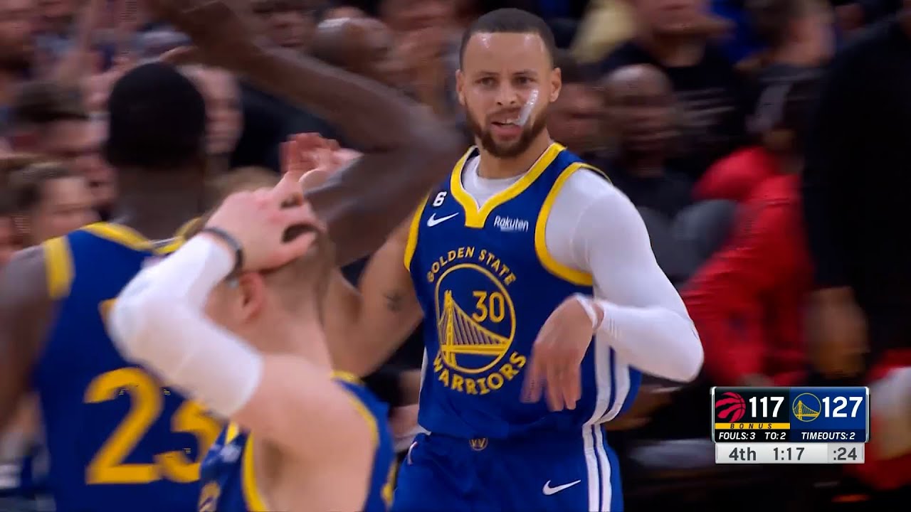 Stephen Curry dances for the Raptors bench after scoring an acrobatic ...