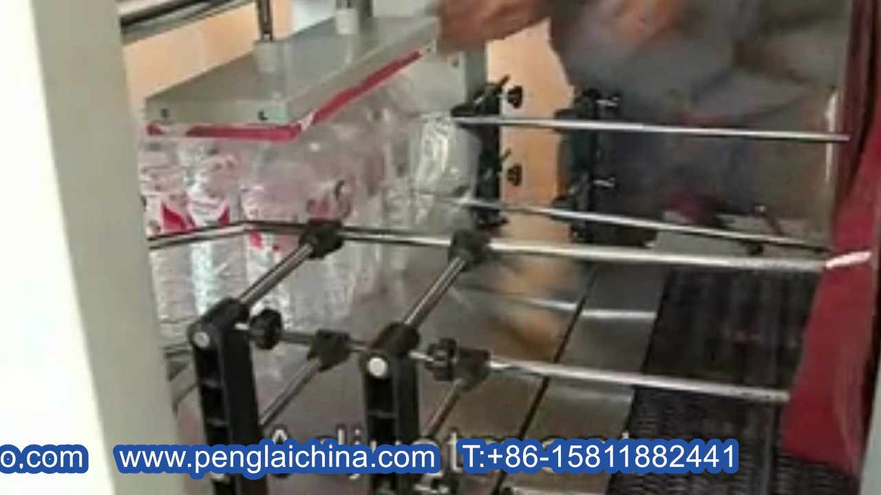 sleeve shrink wrapping machine semi automatic bottles wrapper jet type heating - YouTube