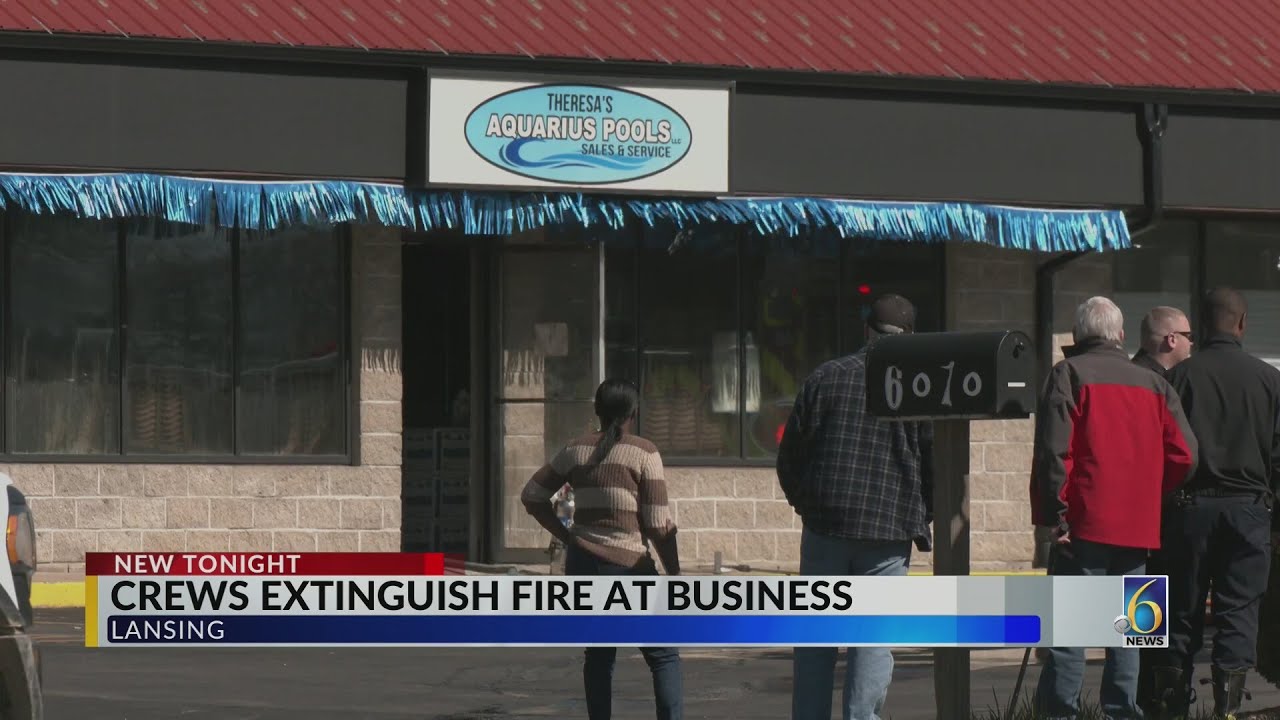 Crews extinguish fire at business - YouTube