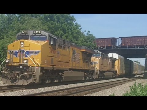 BNSF 6236 Iron Ore Meets UP 7498 Vehicle Train - YouTube