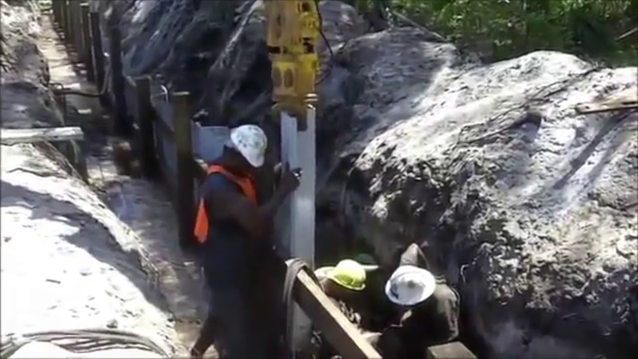 Installation of Sheet Piling Using a Small Vibratory Hammer - YouTube